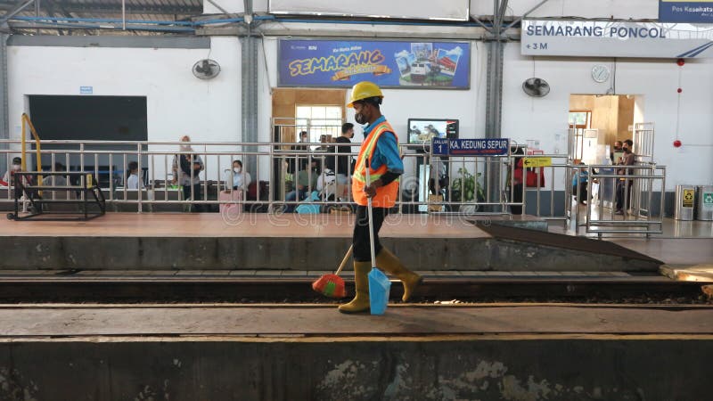 A Janitor is Cleaning at the Train Station Editorial Stock Image ...