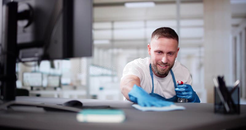 Janitor Cleaning White Desk Stock Image - Image of professional ...