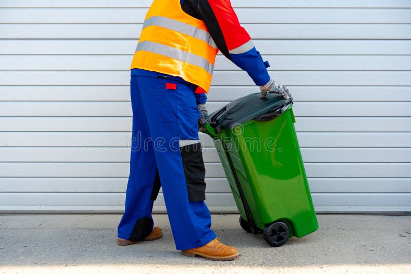 Janitor Takes Garbage Out of Trash Container Outdoors Stock Image ...