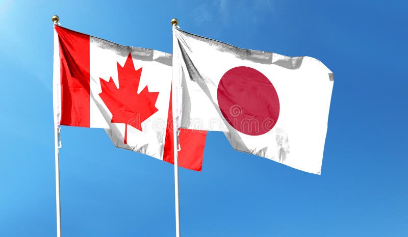 Japan and Canada Flags Against Cloudy Sky. Waving in the Sky Stock ...