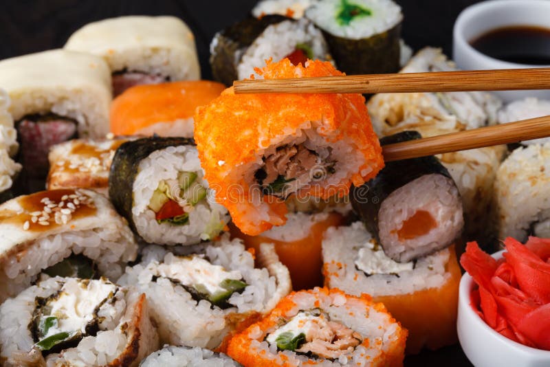 Japan Rolls with Fish and Rice, Pile Asorted on Table Stock Photo ...