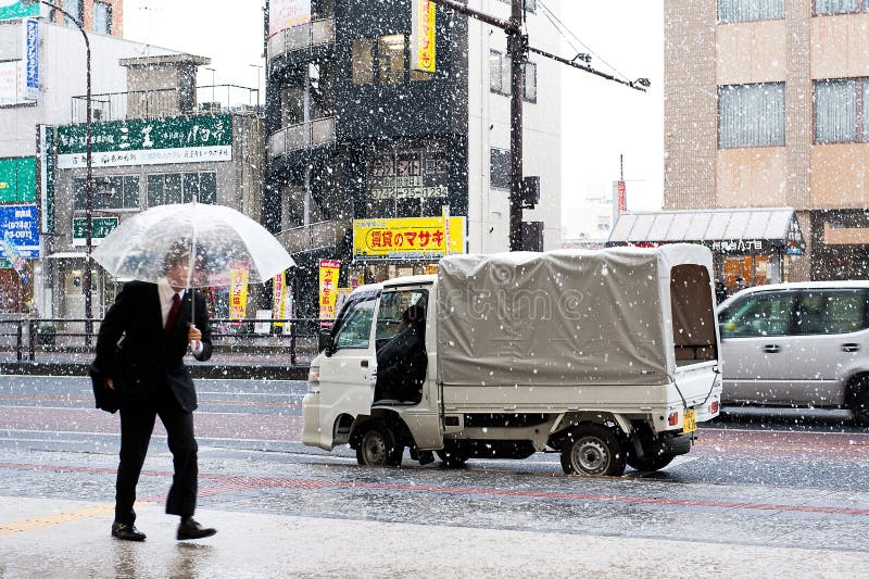 Japan Snow Street and Man editorial stock photo. Image of japanese ...