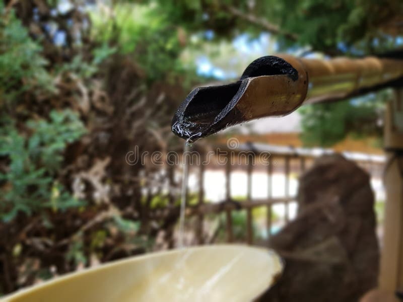 Japanese water feature stock image. Image of light, reflection - 1565315