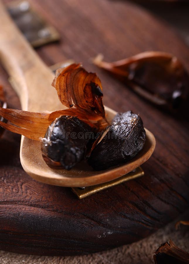 Japanese Black Fermented Garlic on the Table Stock Image - Image of ...