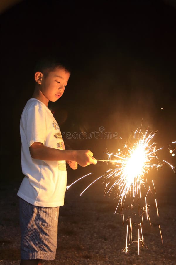 Japanese Boy Doing Handheld Fireworks Stock Image - Image of japanese ...