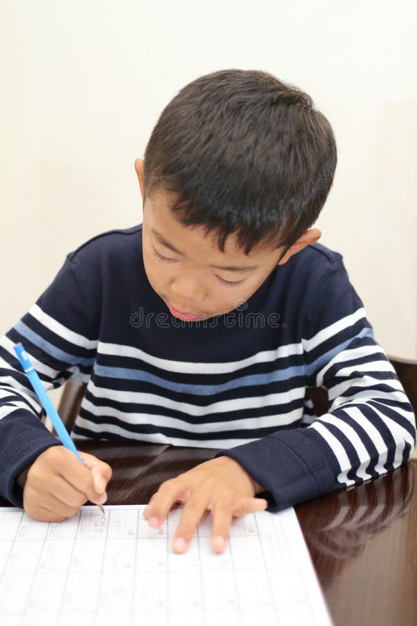 Japanese Boy Doing Homework Stock Image - Image of elementary, grader ...