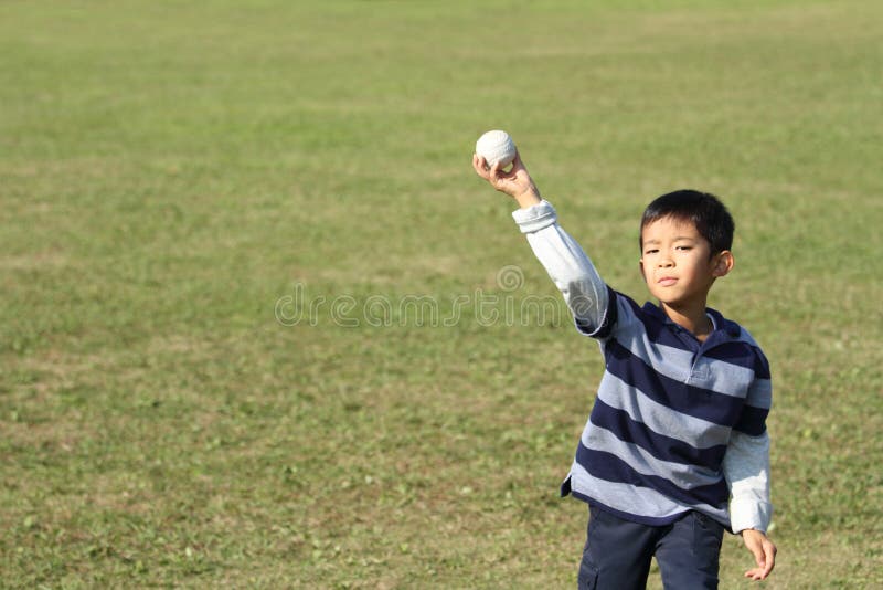 Japanese boy playing catch stock photo. Image of park - 106865382