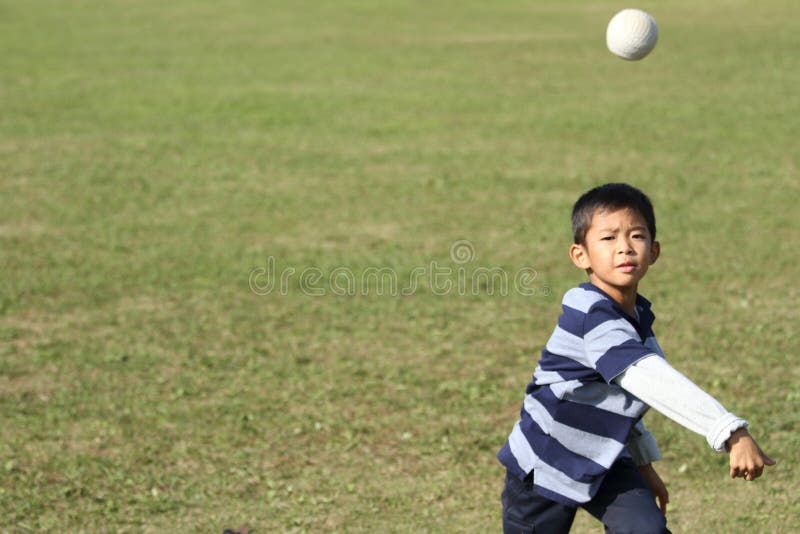 Japanese boy playing catch stock image. Image of cute - 106865393