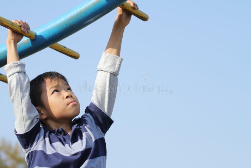 Japanese Boy Playing with a Monkey Bars Stock Image - Image of people ...