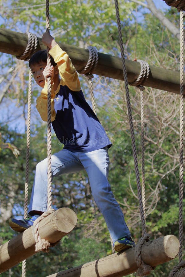 Japanese Boy Playing at Outdoor Obstacle Course Stock Image - Image of ...