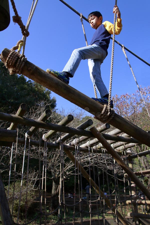 Japanese Boy Playing at Outdoor Obstacle Course Stock Image - Image of ...
