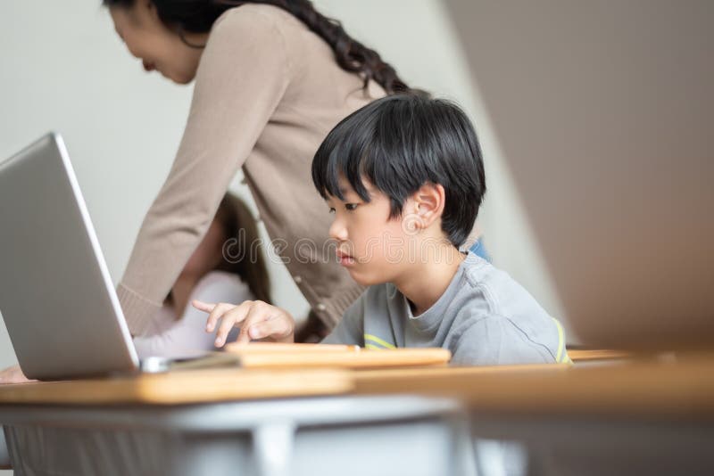 Japanese Boy Studying on Laptop Stock Photo - Image of girl, asian ...