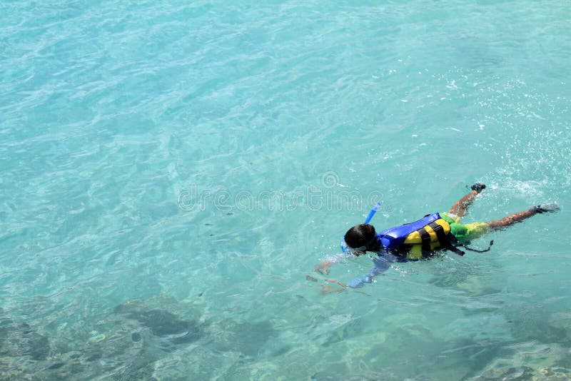 Japanese Boy Swimming with Snorkel Stock Image - Image of emerald ...