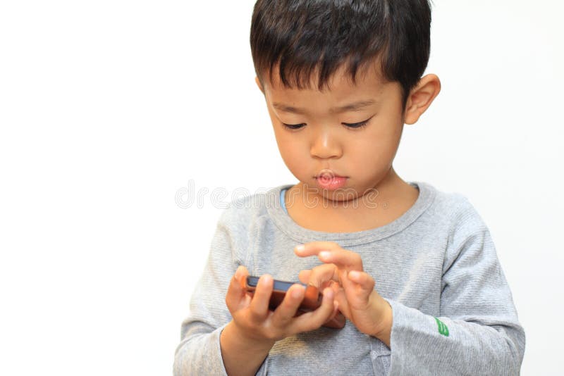 Japanese Boy Using Smart Phone Stock Image - Image of phone, smiling ...