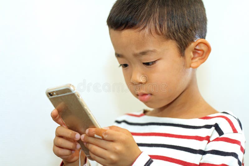 Japanese Boy Using a Smart Phone Stock Image - Image of child, white ...