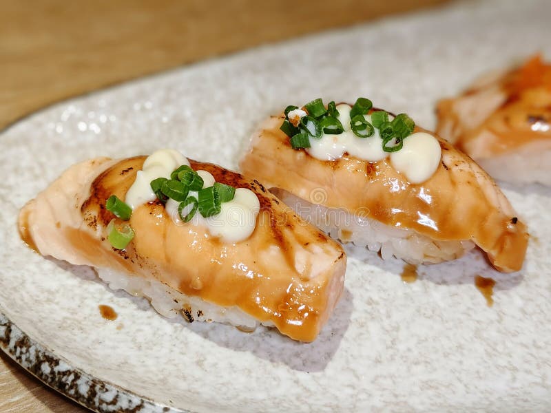 Burnt salmon sushi stock image. Image of japanese, seafood - 386766545