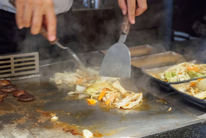 Japanese Chef Cooking Meat and Vegetable in Restaurant Stock Photo ...