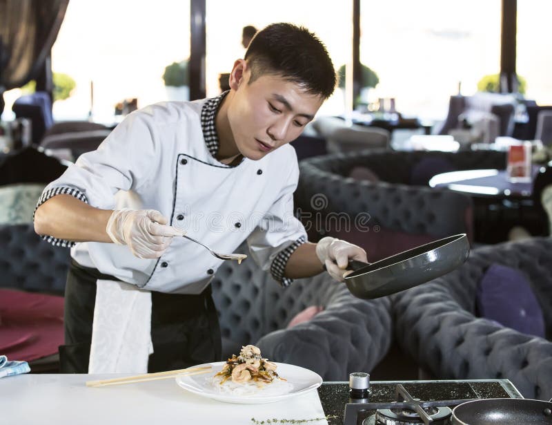 Japanese Sushi Restaurant, Chef Serving Customers Stock Photo - Image ...