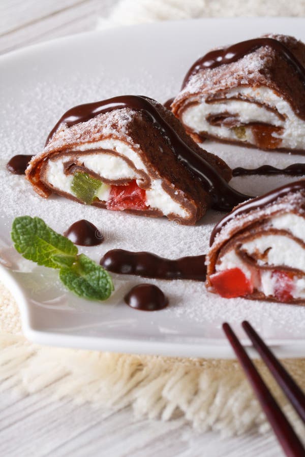 Japanese Chocolate Crepe Rolls with Cheese Close-up. Vertical Stock ...