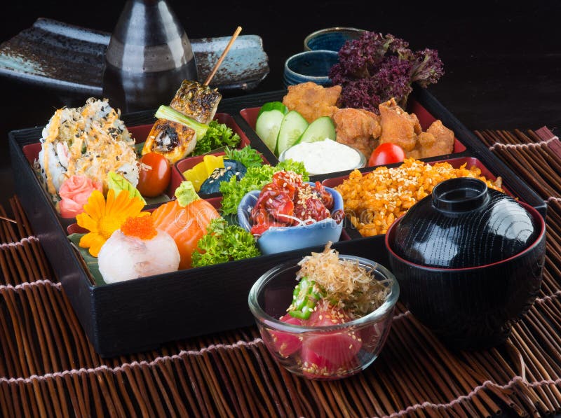 Japanese Cuisine. Lunch Box Set On The Background Stock Photo - Image ...