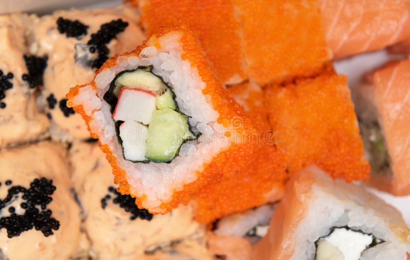 Japanese Cuisine. Sushi Rolls with Fresh Ingredients Stock Photo ...