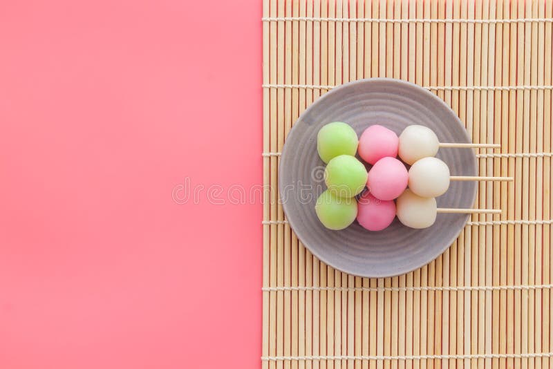Japanese Dango Dessert in Pink, White and Green Colors, Copy Space ...