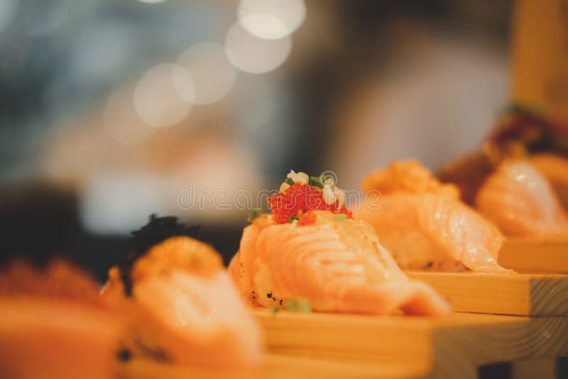 Japanese Fresh Salmon Sushi with Various Topped Stock Photo - Image of ...