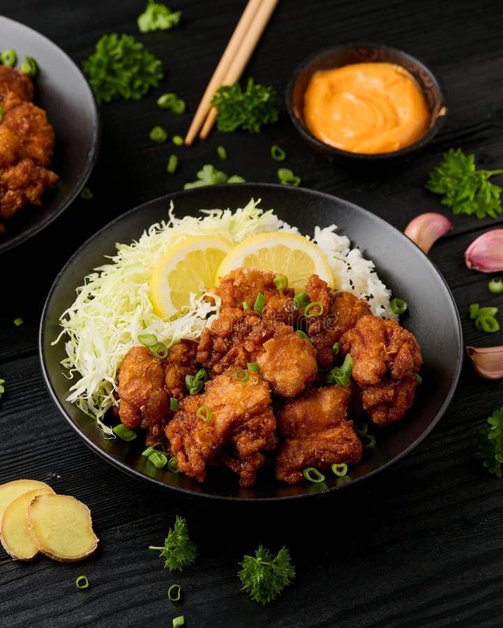 Japanese Fried Crispy Chicken Karaage in Black Bowl with Rice and ...