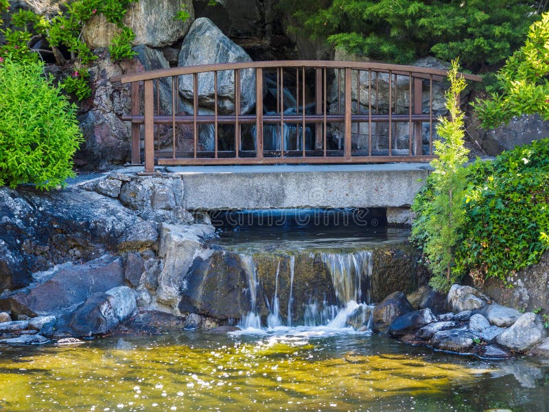 Japanese Garden Design with Water Stream and Bridge Stock Photo - Image ...