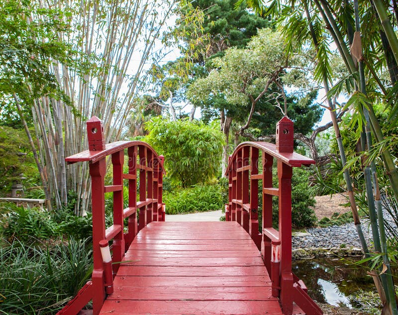 Red Bridge In Japanese Garden Stock Image - Image of bridge, reflection ...