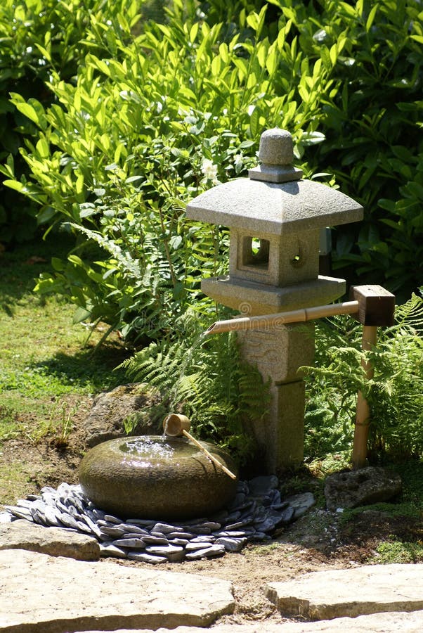 Japanese water feature stock image. Image of light, reflection - 1565315