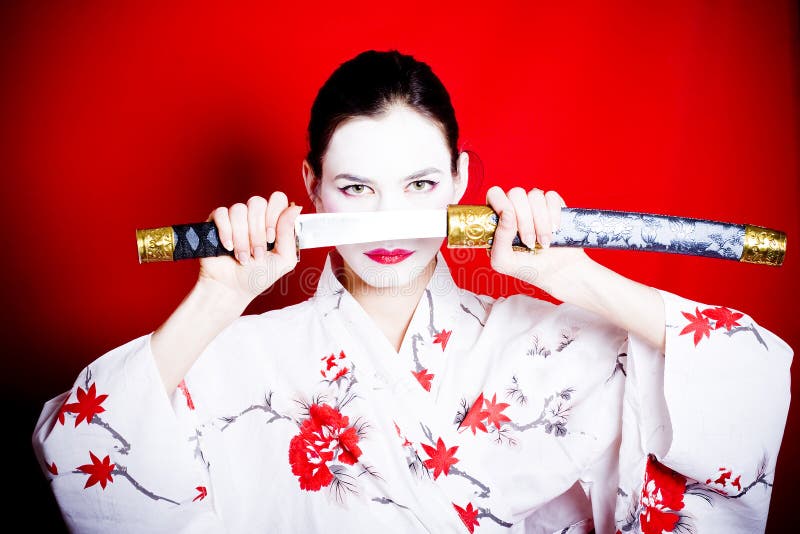 Japanese Geisha with sword stock photo. Image of heavy - 6937680