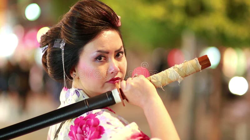 Japanese geisha with sword stock video footage. Video of adult - 36757382