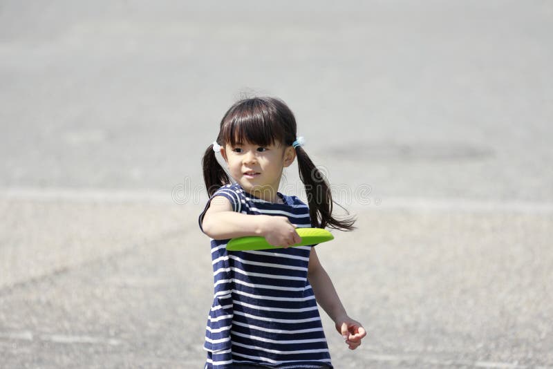 Japanese Girl Playing Flying Disc Stock Photo - Image of playing ...