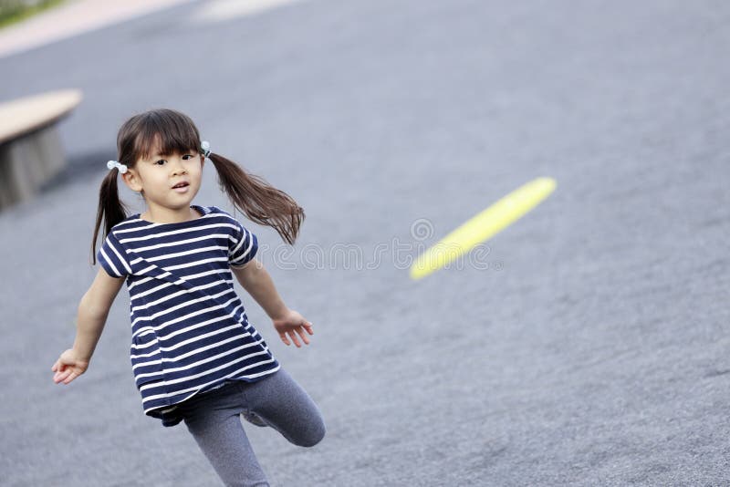 Japanese Girl Playing Flying Disc Stock Image - Image of disc, girl ...