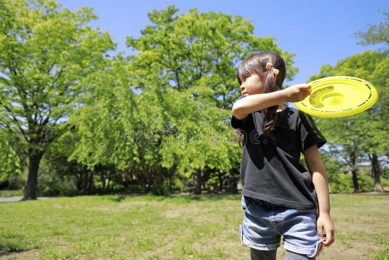 Japanese Girl Playing Flying Disc Stock Photo - Image of disc ...