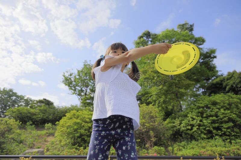 Japanese Girl Playing Flying Disc Stock Photo - Image of play, person ...