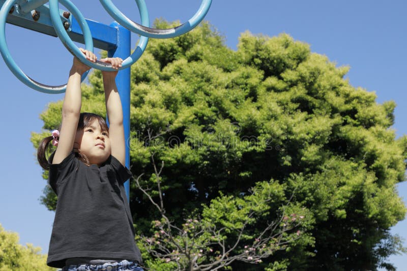 Japanese Girl Playing with a Monkey Bars Stock Image - Image of person ...