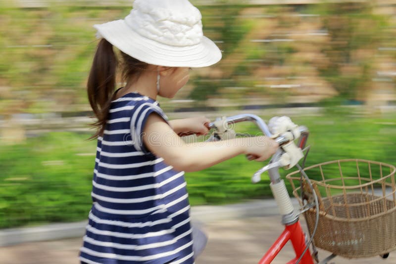 Japanese Girl Riding on the Bicycle Stock Image - Image of four, child ...