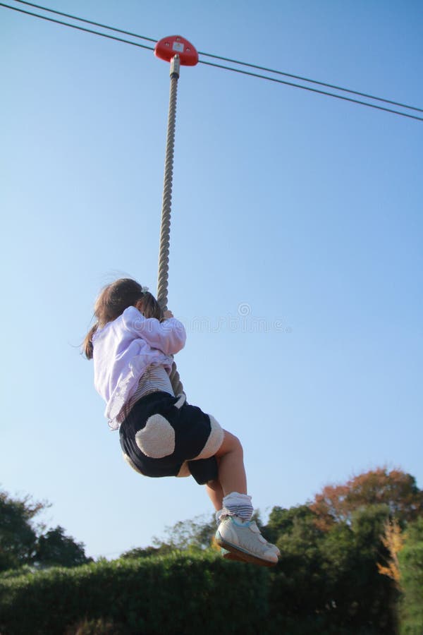 Japanese Girl Playing with Flying Fox Stock Photo - Image of clear ...