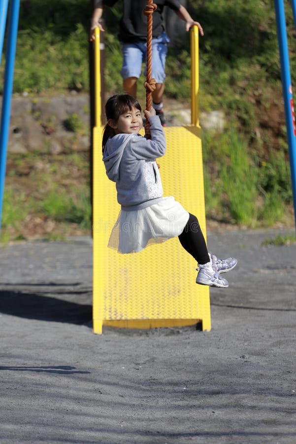 Japanese Girl Playing with Flying Fox Stock Image - Image of girl ...
