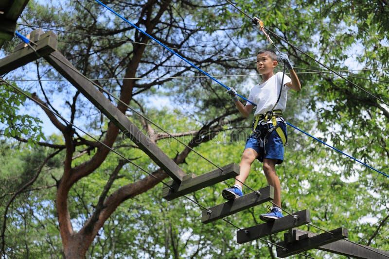 Japanese Junior High School Student Playing at Outdoor Obstacle Course ...