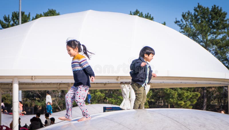 Japanese Kids Playing in Playground Stock Image - Image of playing ...
