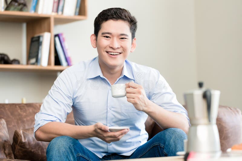 Japanese Man Drinking Coffee in His Living Room Stock Photo - Image of ...