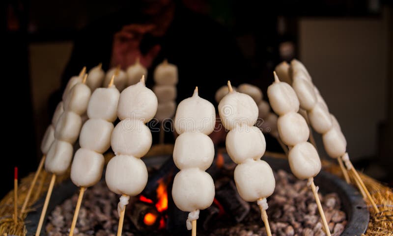 Mitarashi Dango on Fire stock photo. Image of cuisine - 102375524