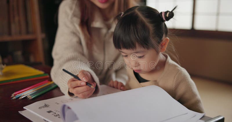 Japanese Mom, Child and Education with Homework, Writing and Books for ...