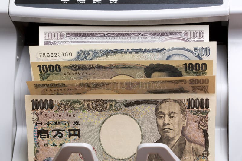 Japanese Money in a Counting Machine Stock Image - Image of closeup ...