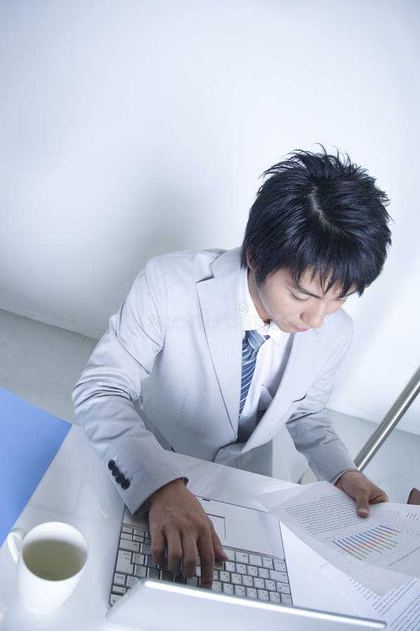 Japanese office worker stock image. Image of document - 10129553