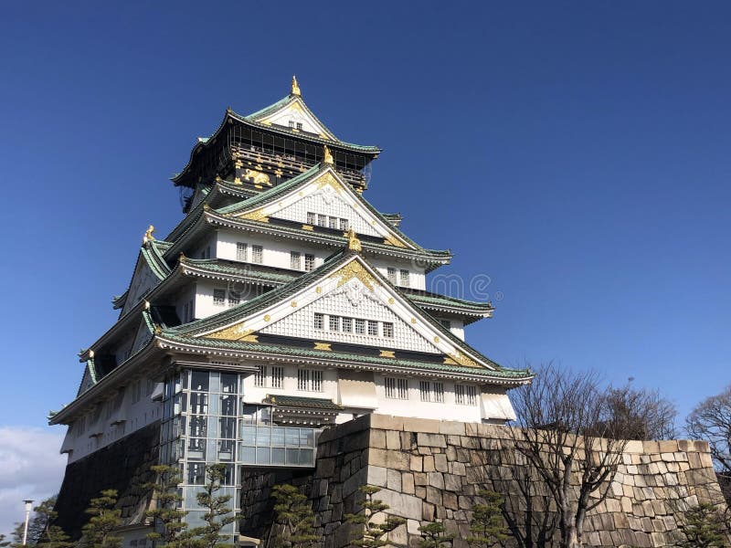 Japanese Osaka Castle Museum Captured Against a Blue Sky Stock Photo ...