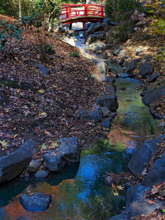 Japanese Red Bridge Over a Stream. Stock Image - Image of bridge ...